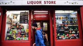 Minimum price 'cuts drinking by half a pint a week' - BBC News
