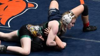 Teen girl beats boys to 'make history' as state champion - BBC News