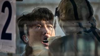 Covid: Why are some places testing Chinese arrivals? - BBC News