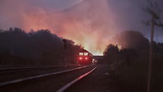Llangennech: Diesel spill after train derails catching fire - BBC News