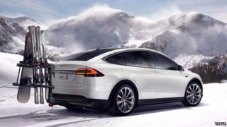 Tesla unveils Model X car with Falcon Wing doors - BBC News