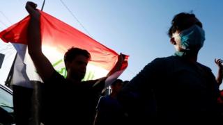 Basra protests: Iraq government buildings torched in new unrest - BBC News