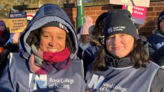 Nottingham nurses take to picket line 'with heavy heart' - BBC News