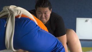 Inside the scandal-hit world of Japan's sumo wrestlers - BBC News
