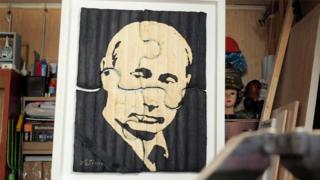 Putin warns of tough Russian action if West crosses 'red line' - BBC News
