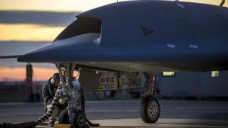 Drone technology used for pilotless fighter aircraft - BBC News