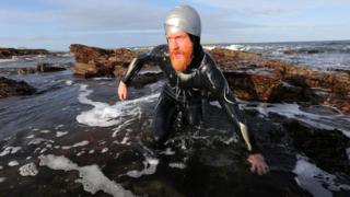 Jasmine Harrison is first woman to swim length of UK - BBC News