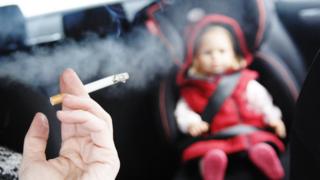 Car smoke ban 'to start in October' - BBC News