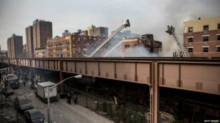 In pictures: New York building collapses after blast - BBC News