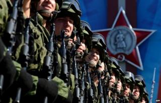 Ukraine crisis: Vladimir Putin visits annexed Crimea - BBC News