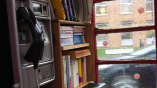 Red phone box in Wall becomes novel mini-library - BBC News