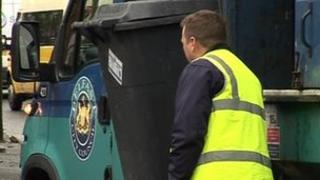 Belfast bin-men paid extra to clear up strike backlog - BBC News