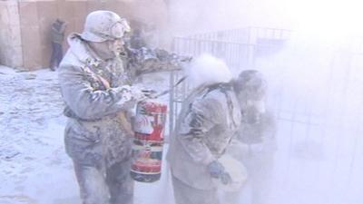 Flour bombs and fire crackers in Spanish town of Ibi - BBC News