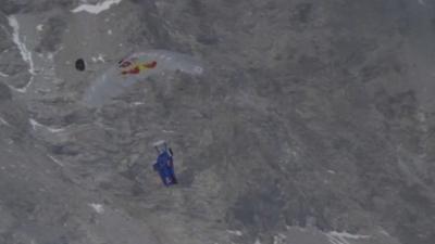 Record breaking base jump from world's tallest building - BBC News