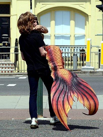 'Mermaids' flood Brighton and Hove seafront - BBC News