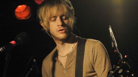 Greg Gilbert's niece takes on swimming challenge in his memory - BBC News