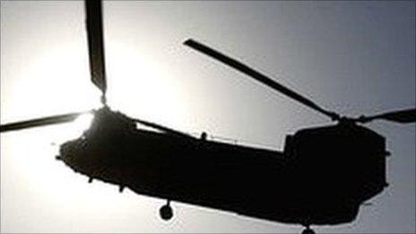 RAF unveils first of 14 new Chinook helicopters - BBC News