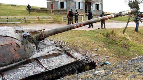 Paintballing for Afghanistan training town in Brecon Beacons - BBC News