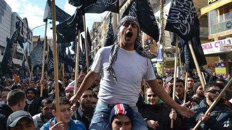 Armed Assad supporters and opponents clash in Lebanon - BBC News