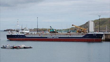 Alderney Harbour crane snaps while loading - BBC News