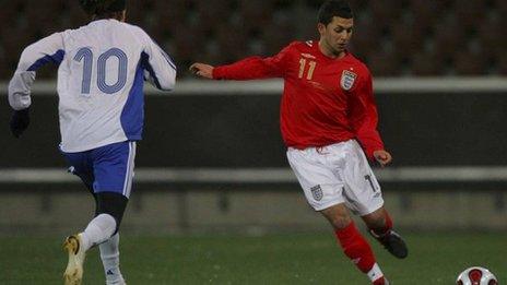 Homeless work helps footballer Erkan Okay turn life around - BBC News