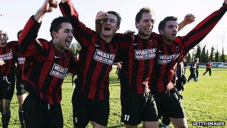 Homeless work helps footballer Erkan Okay turn life around - BBC News