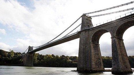 Menai Bridge's promenade centenary marked by parade - BBC News