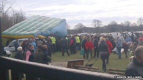 Harrogate inflatable slide blows over injuring five - BBC News