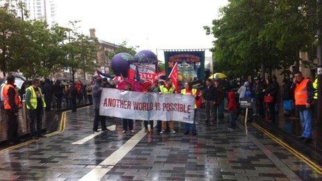 Marchers protest in Belfast against G8 policies - BBC News
