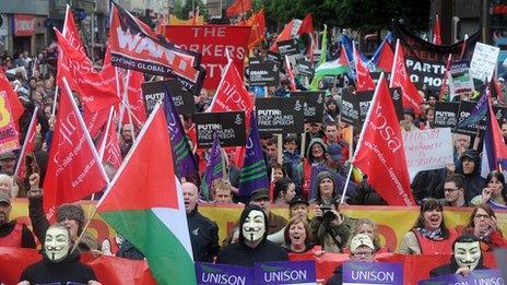 Marchers protest in Belfast against G8 policies - BBC News