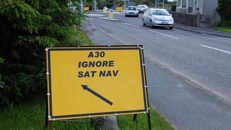 Sat-navs directing drivers wrong way down A30 slip road - BBC News