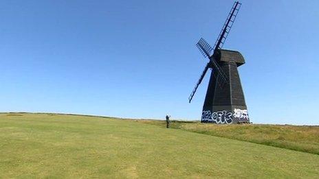 Graffiti removed from historic Rottingdean Windmill - BBC News