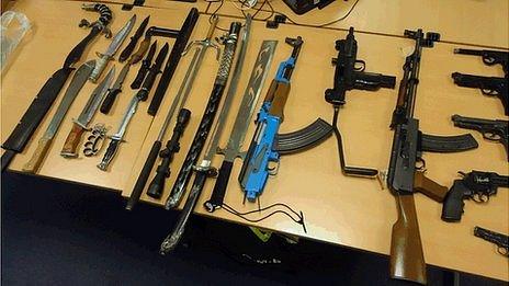 'Arsenal' of weapons found in drug raids on Bolton street - BBC News