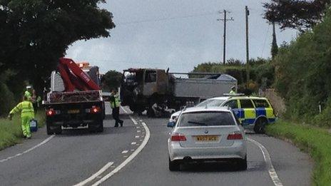 Two killed in A30 lorry and car crash - BBC News