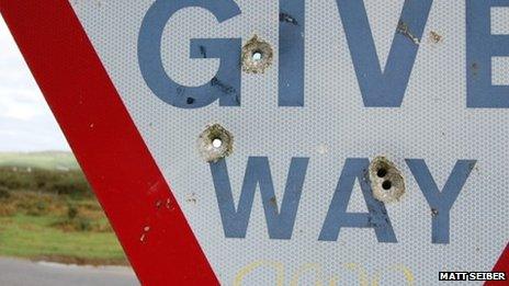 'Indiscriminate' shooting damages South West road signs - BBC News