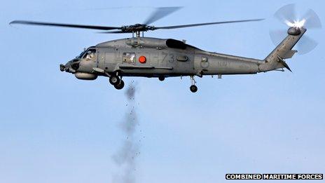 Suspected pirates caught in joint naval operation - BBC News