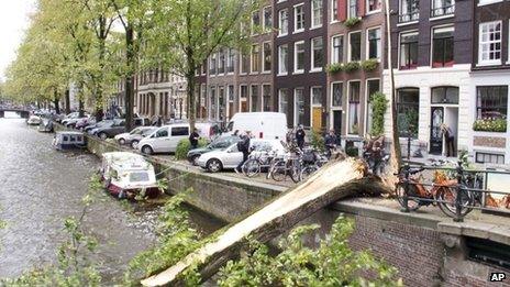 Storm lashes northern Europe leaving at least 13 dead - BBC News