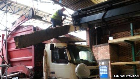 Watford Jewson crash lorry 'holding up roof' moved after six days - BBC ...