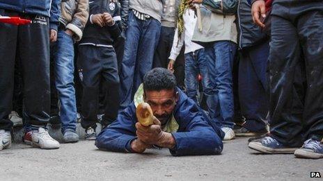 Tunisia leader 'hopeful' despite Arab Spring protests - BBC News
