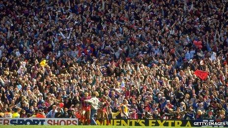 Fans groups want a return to standing at football games - BBC News