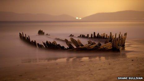 Wreck of 19thC schooner Sunbeam laid bare on Kerry beach - BBC News