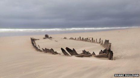 Wreck of 19thC schooner Sunbeam laid bare on Kerry beach - BBC News