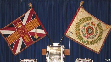 Regimental colours are laid to rest 'but never dead' - BBC News