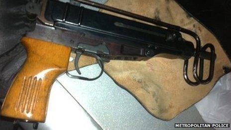 Nine held after a sub-machine gun is found in house raid - BBC News