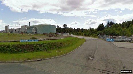 Firefighters tackle large woodchip blaze in Invergordon - BBC News