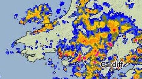 Rain brings flash flooding to Cardiff area - BBC News