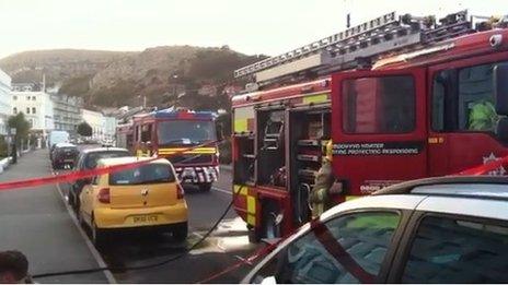Crews tackle Llandudno seafront hotel fire - BBC News