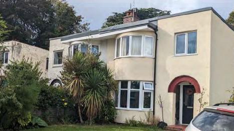 Norwich homeowners keep yellow render despite council criticism - BBC News