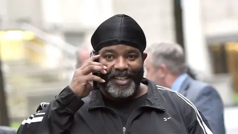 Brian McIntyre: Boxing trainer who brought gun to UK sentenced