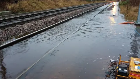 Severe flooding disrupts trains and trams in parts of Scotland